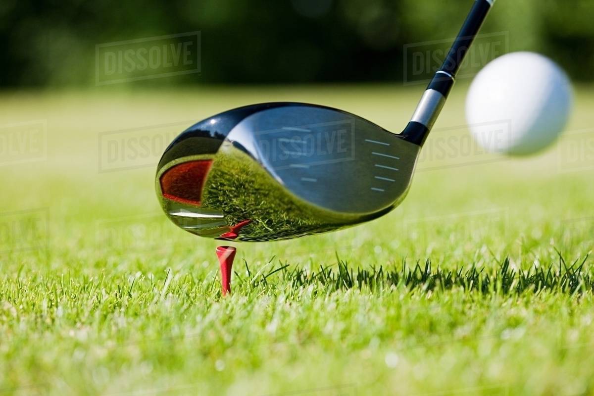 Golf club and tee - Royalty-free Stock Photo | Dissolve