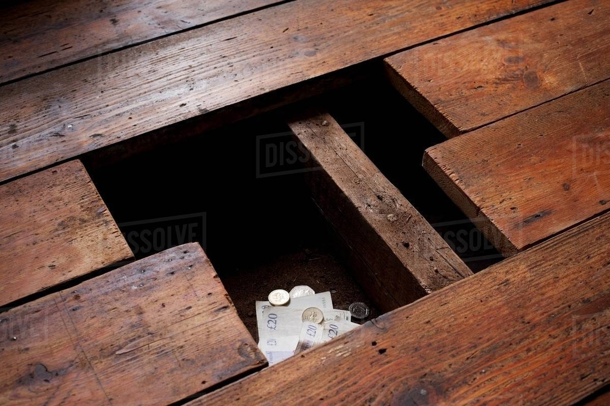 Money under floorboards - Royalty-free Stock Photo | Dissolve