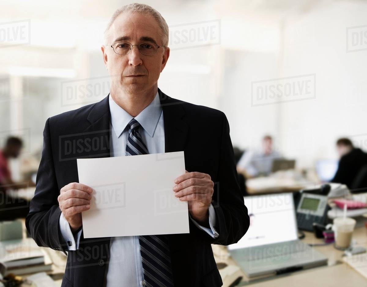 Portrait of senior man holding blank sheet of paper - Royalty-free ...