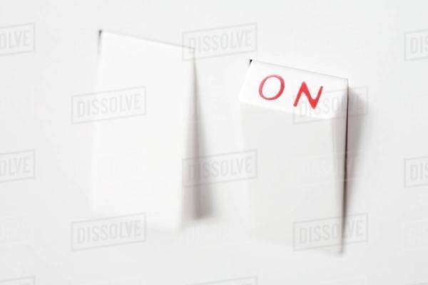 Close up of an on switch - Stock Photo - Dissolve