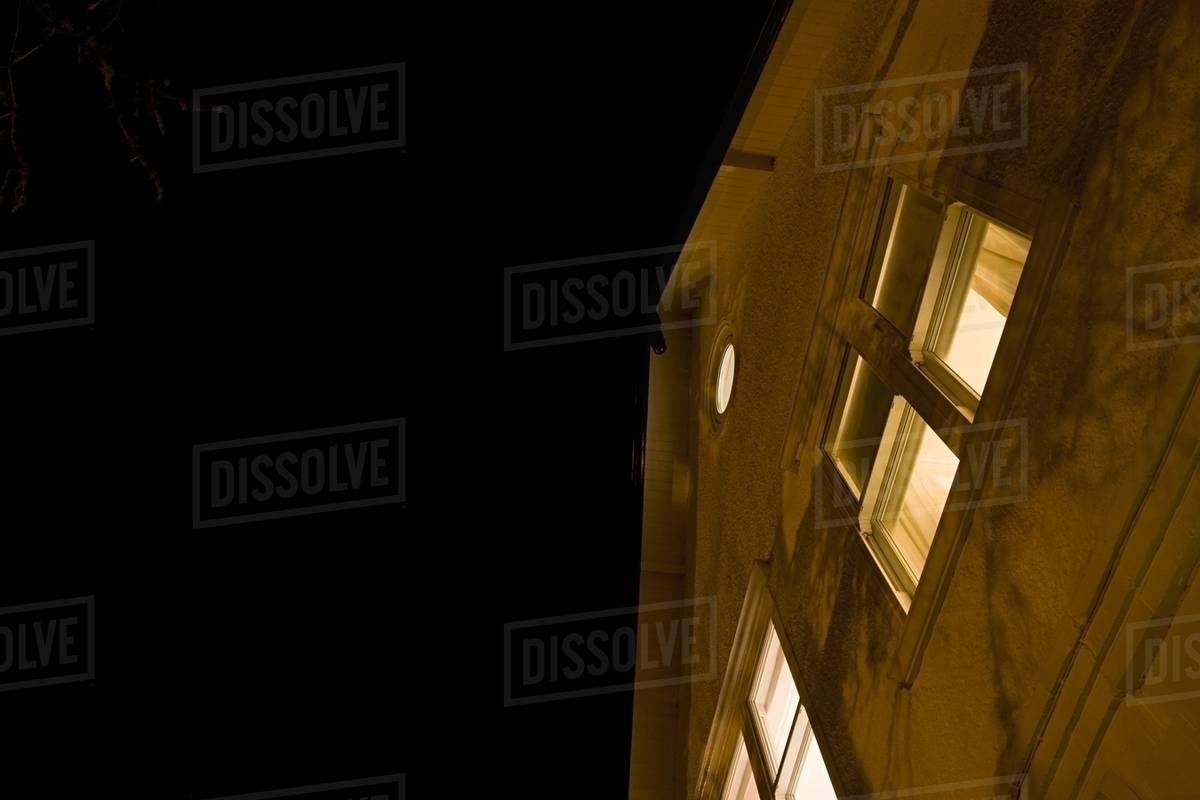A house exterior at night - Stock Photo - Dissolve