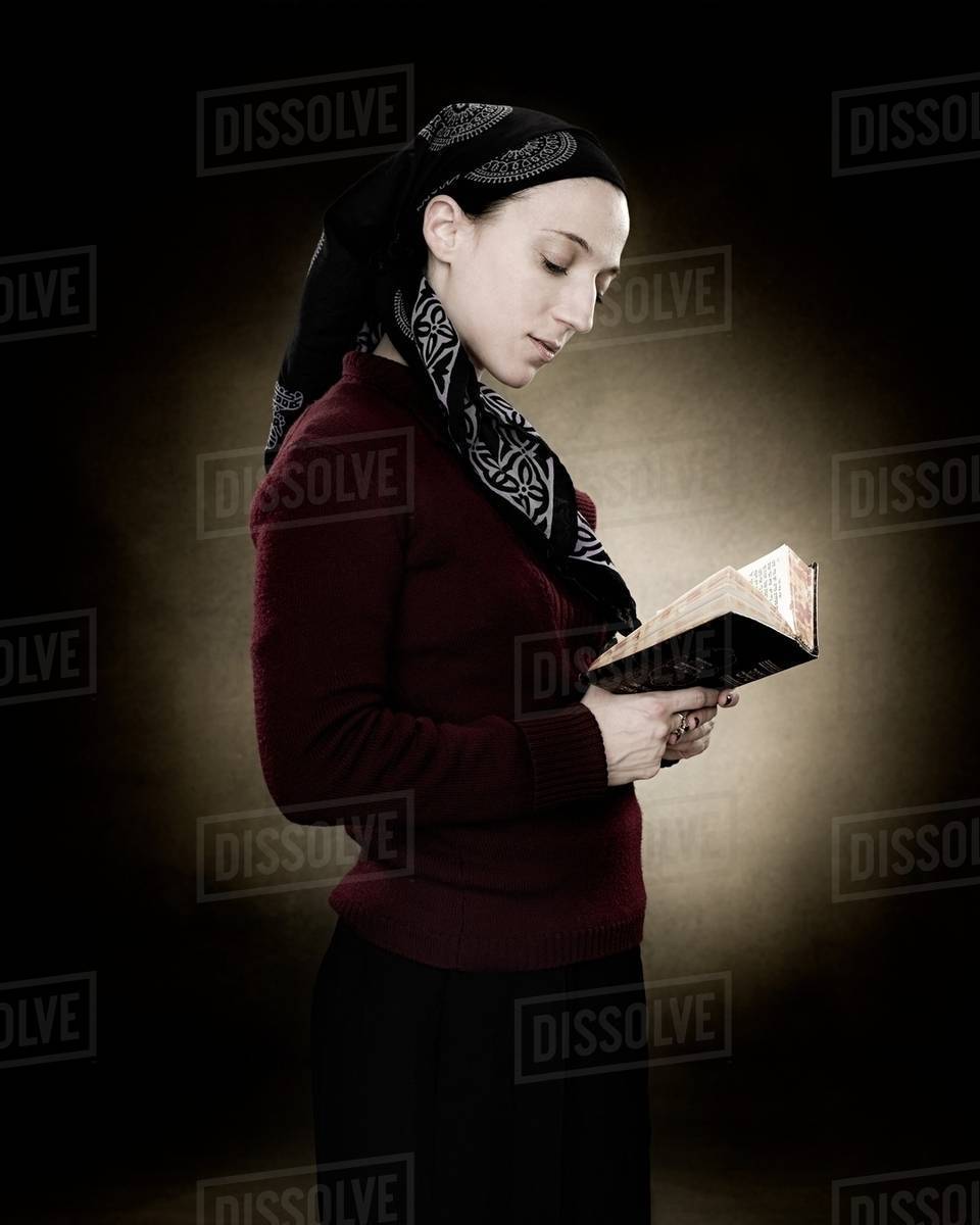 A young jewish woman reading a prayer book - Royalty-free Stock Photo ...