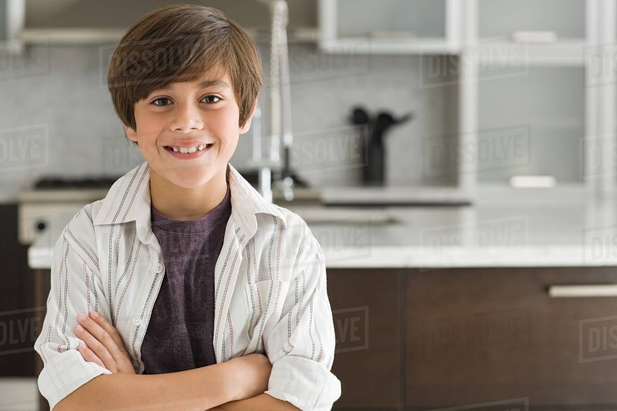 Portrait of a smiling hispanic boy - Royalty-free Stock Photo | Dissolve
