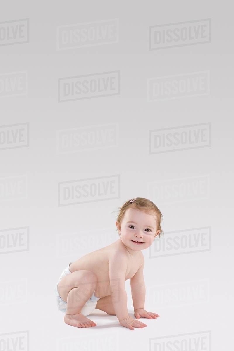 Baby crouching - Royalty-free Stock Photo | Dissolve
