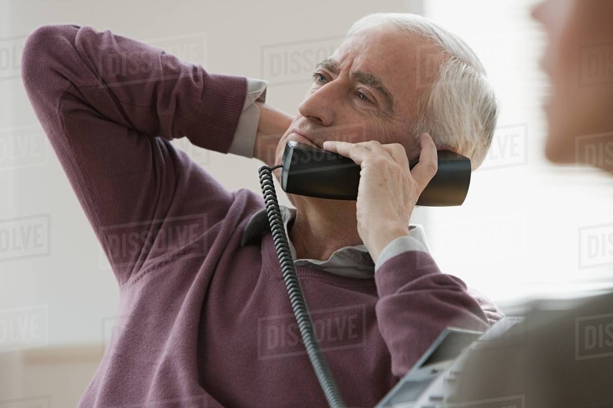 Man on telephone - Royalty-free Stock Photo | Dissolve
