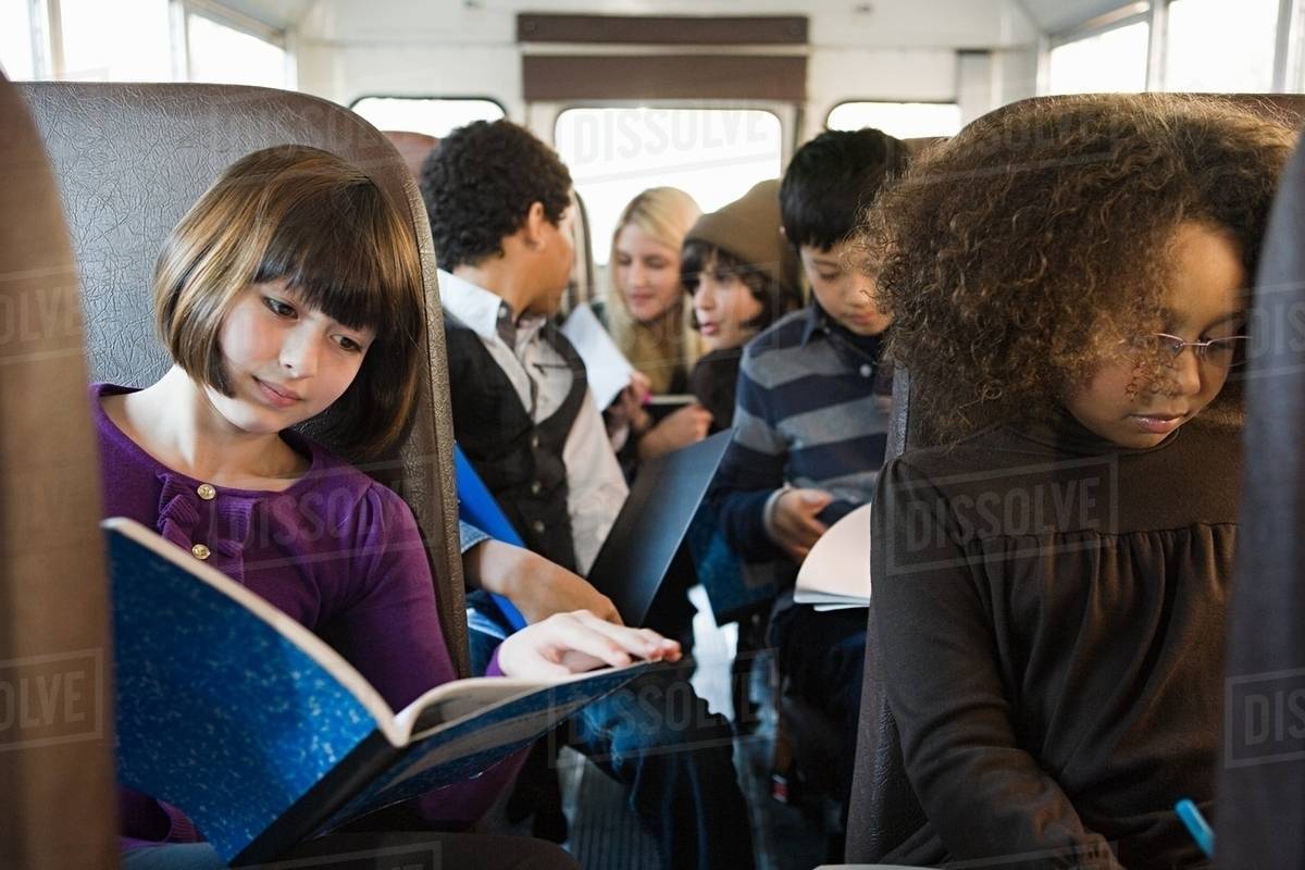 Children on school bus - Royalty-free Stock Photo | Dissolve