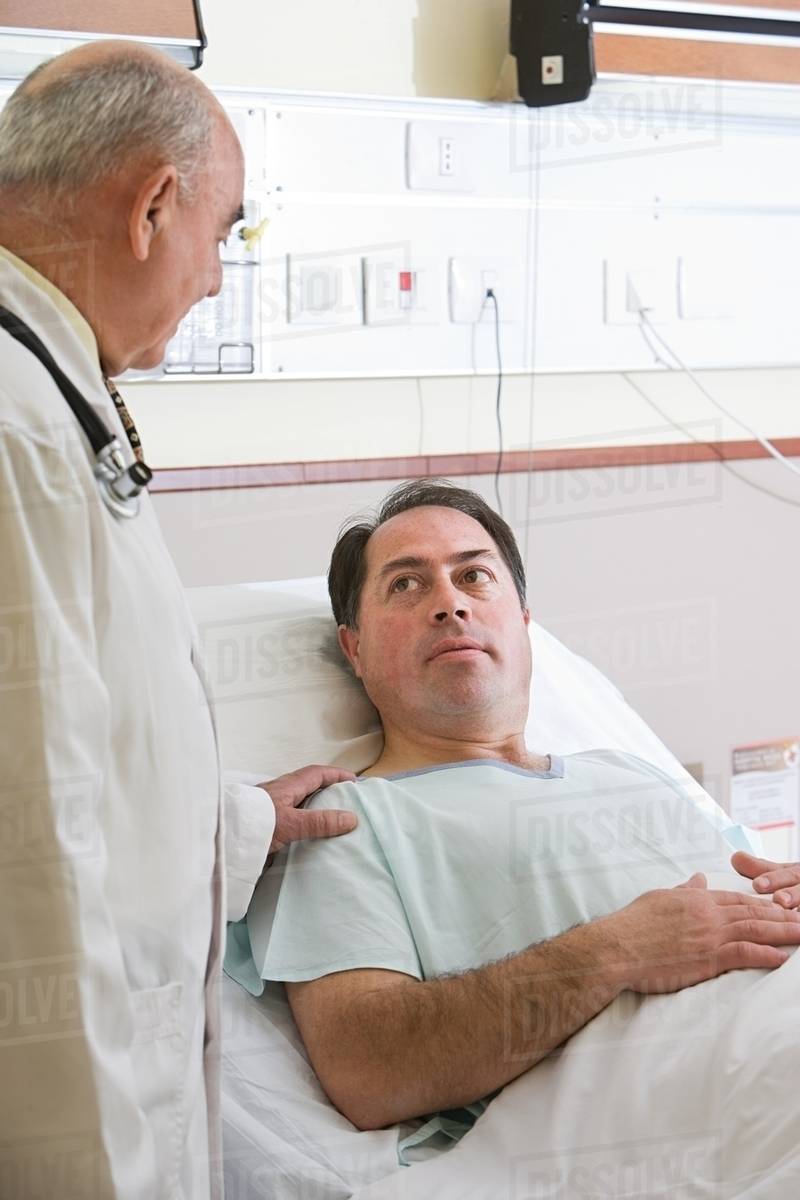 Doctor and patient in hospital - Royalty-free Stock Photo | Dissolve