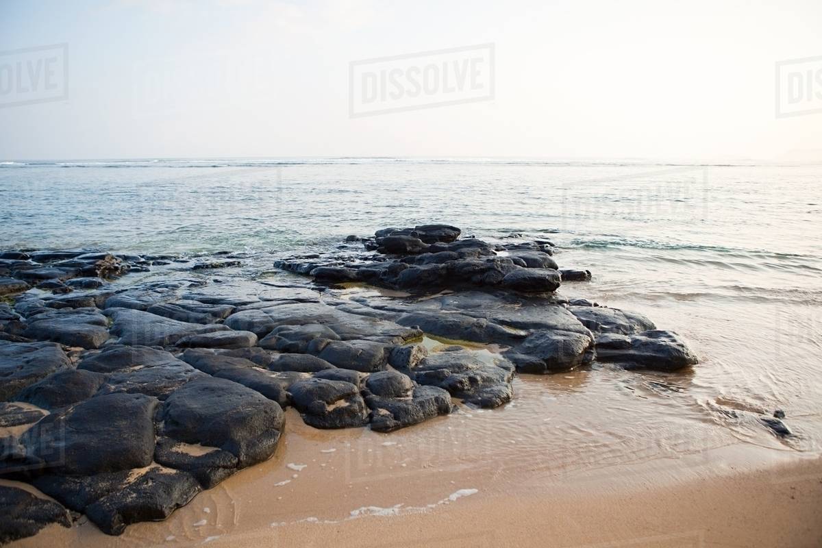 Rocks on hawaiian beach - Stock Photo - Dissolve