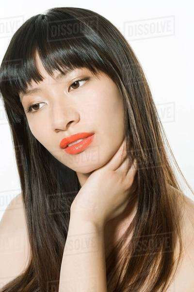 Beautiful young woman, head shot - Royalty-free Stock Photo | Dissolve