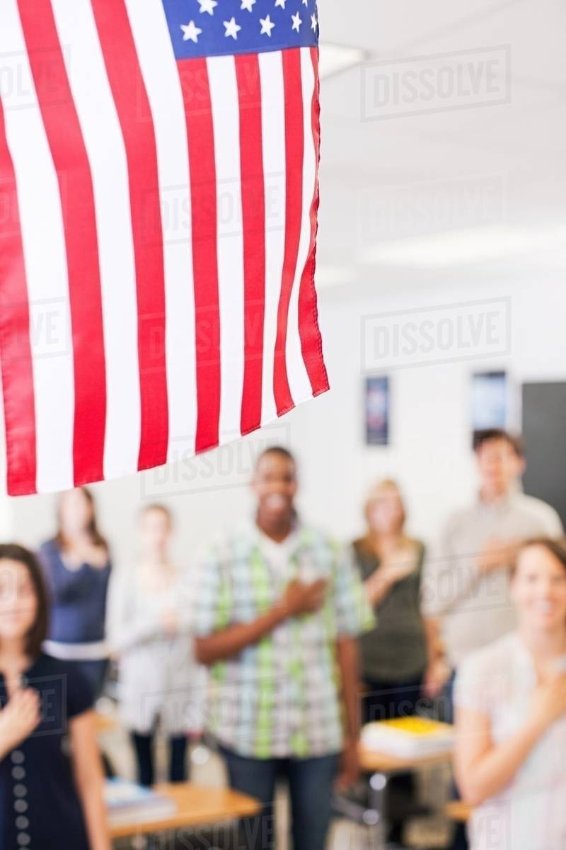 High school students swearing allegiance to the American flag - Royalty ...