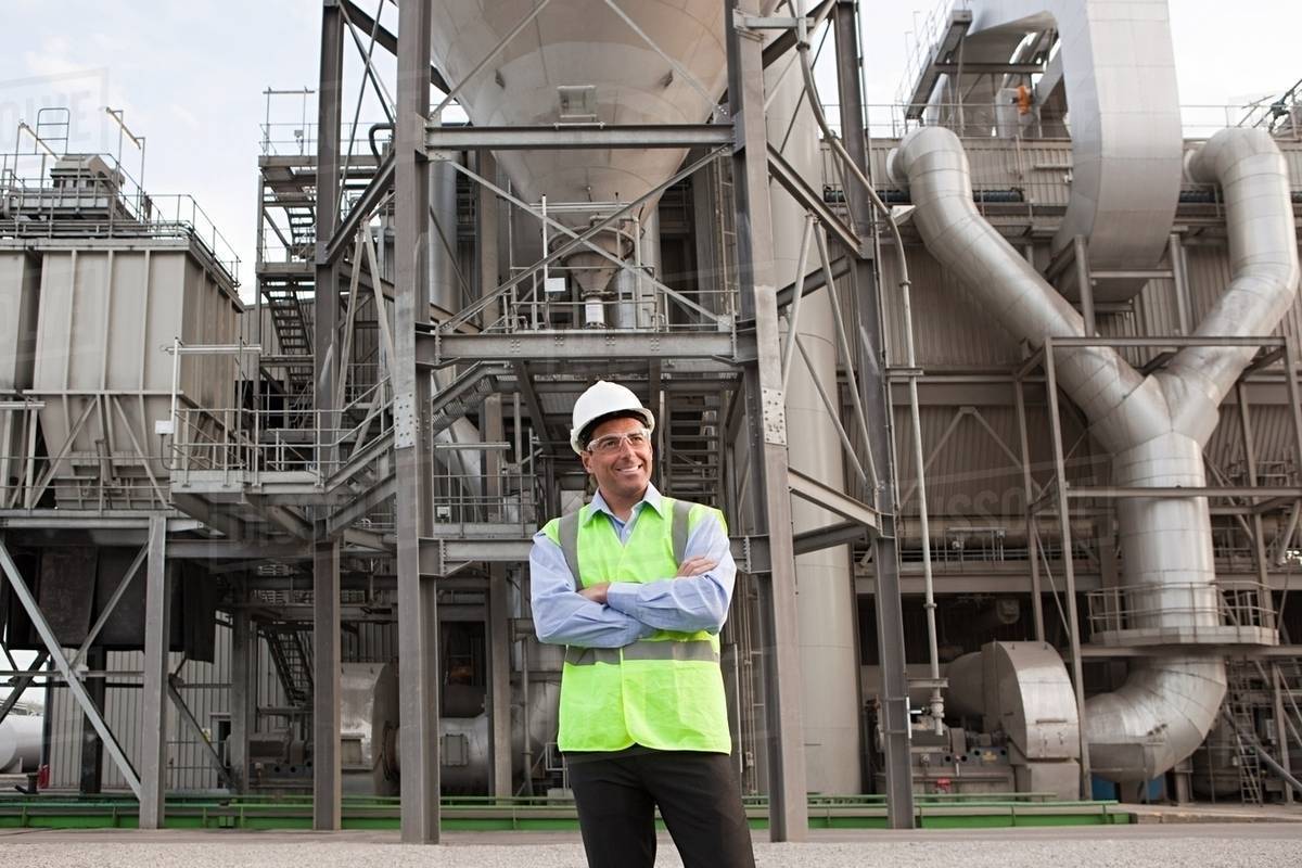 Engineer outside factory - Stock Photo - Dissolve