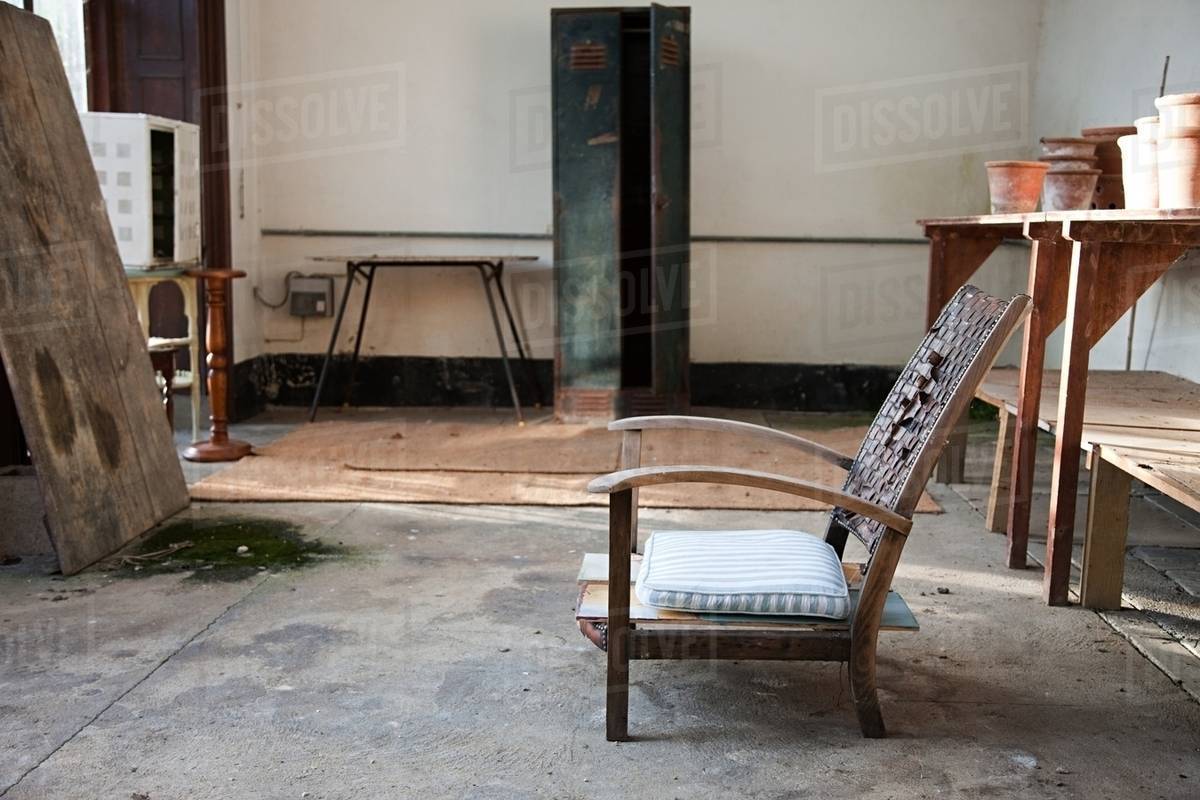 Empty wooden chair indoors - Royalty-free Stock Photo | Dissolve