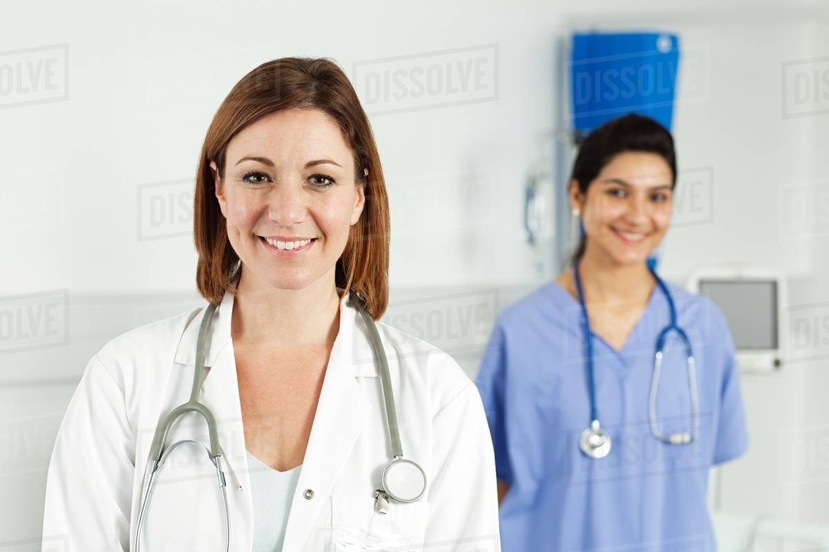 Portrait of two female doctors - Royalty-free Stock Photo | Dissolve