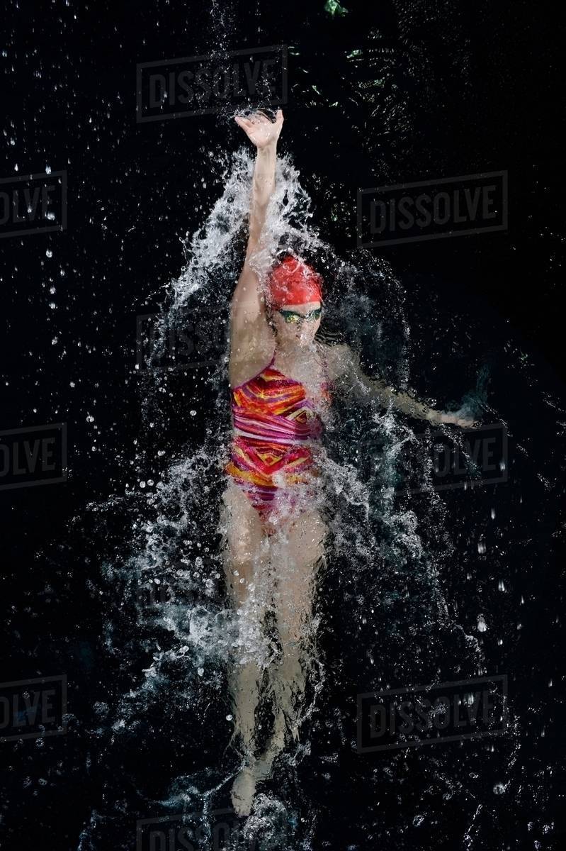 Teenage girl doing backstroke in swimming pool - Royalty-free Stock ...