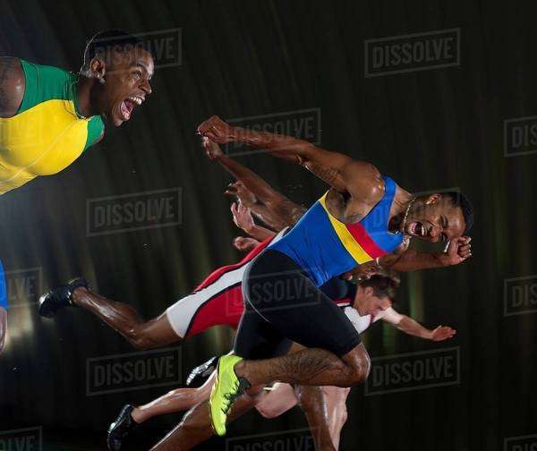 Athletes finishing race - Royalty-free Stock Photo | Dissolve