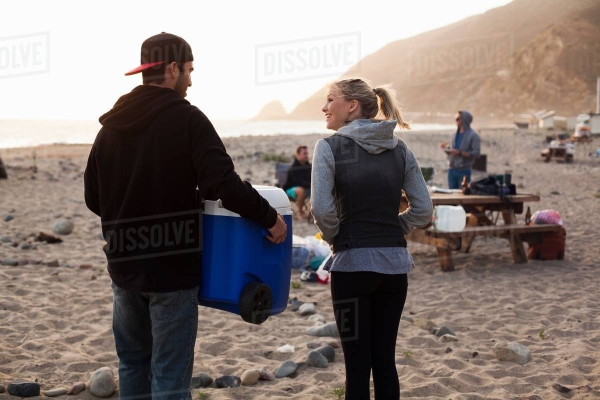 Group of friends camping on beach, Malibu, California, USA - Stock ...