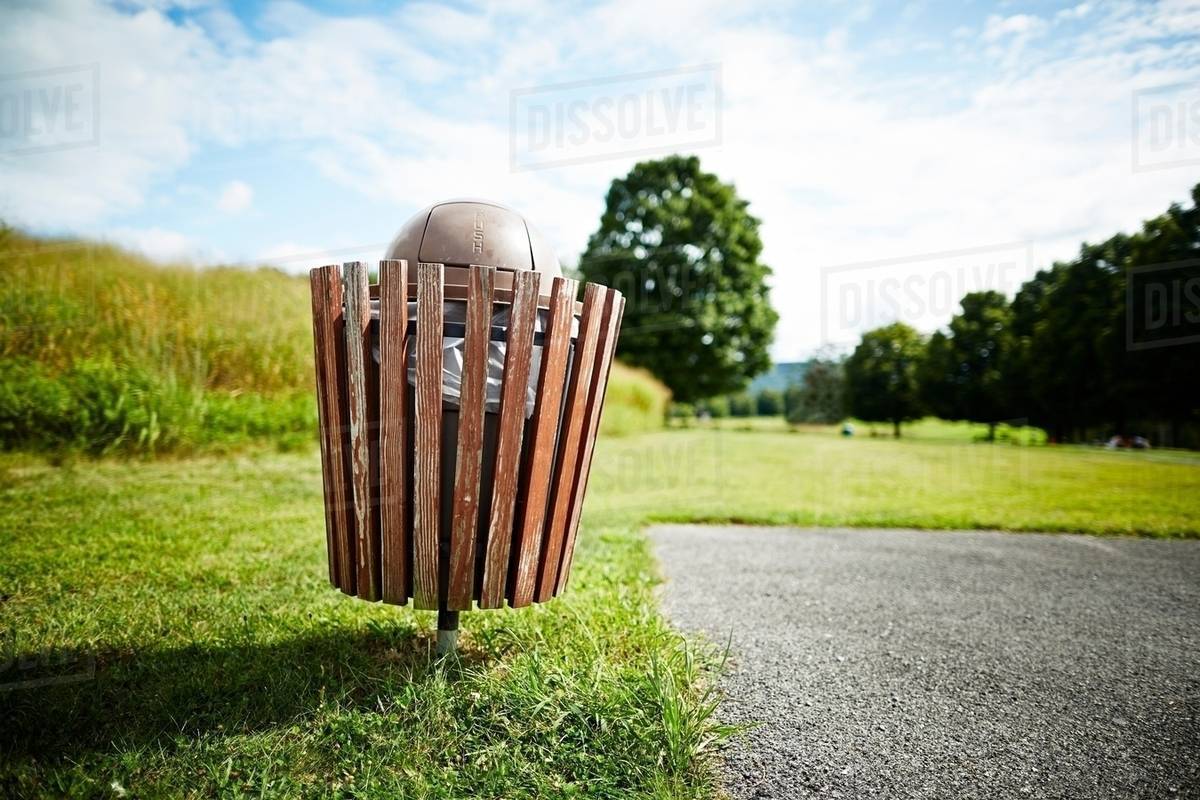 Trash bin in park - Royalty-free Stock Photo | Dissolve