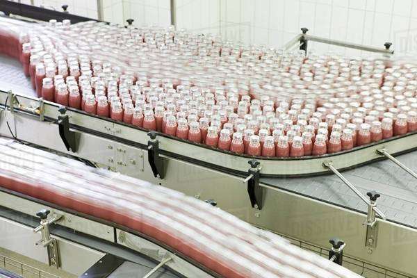 Bottles being made in a factory - Royalty-free Stock Photo | Dissolve