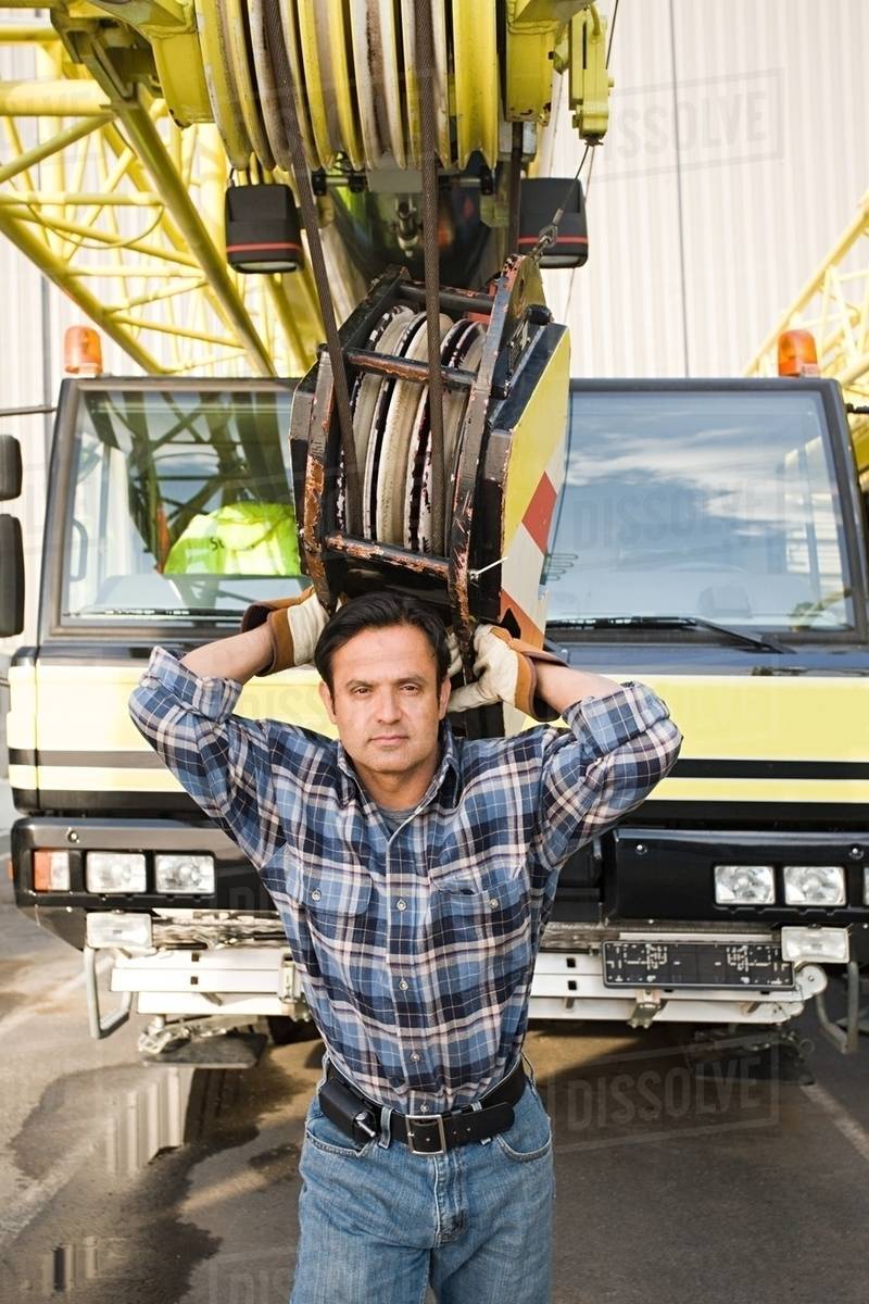 Man with crane truck - Royalty-free Stock Photo | Dissolve