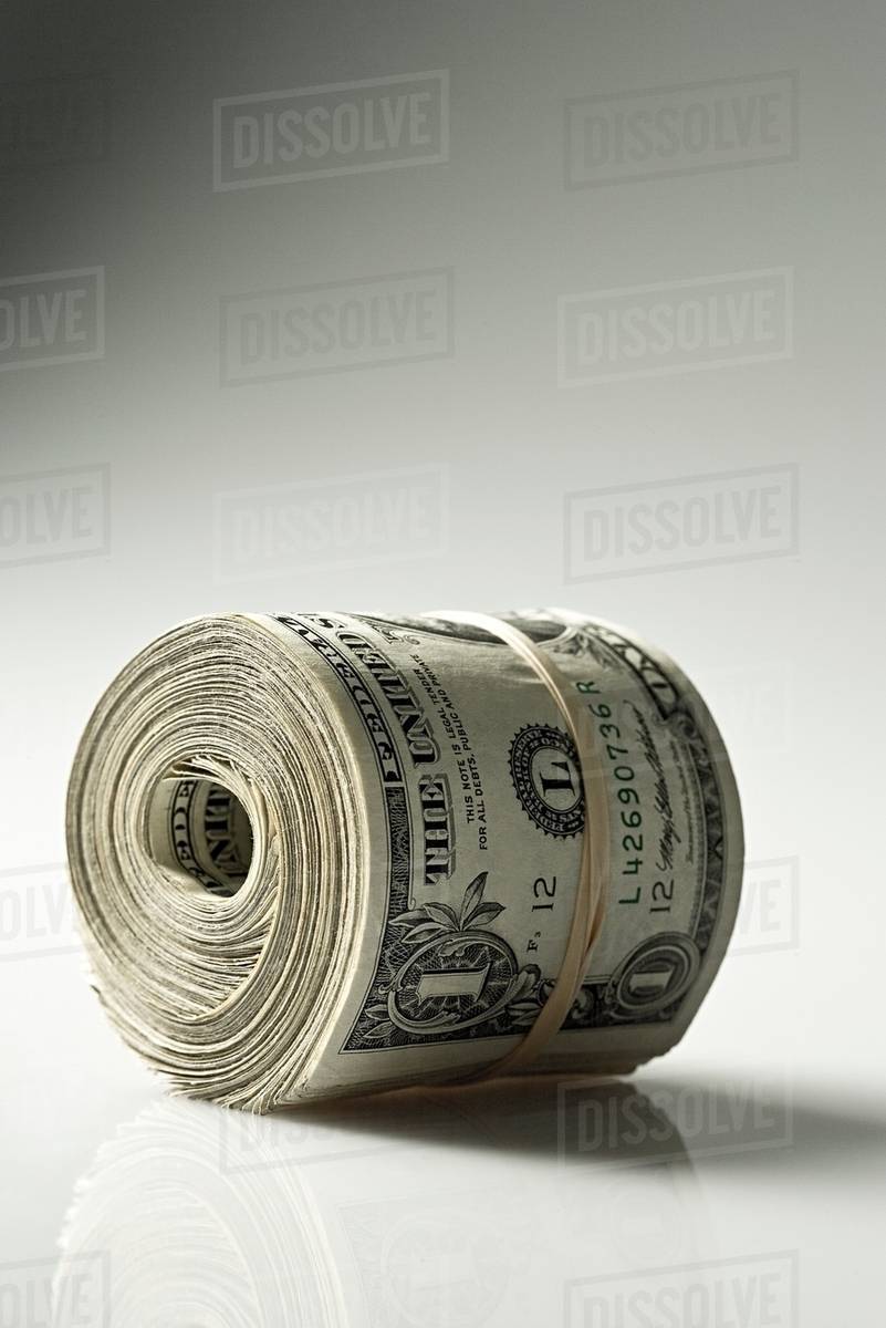Rolled up banknotes - Stock Photo - Dissolve