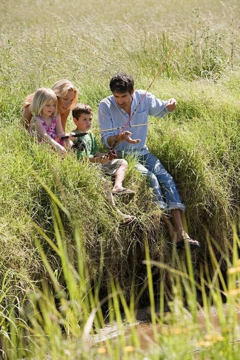 A family fishing - Royalty-free Stock Photo | Dissolve
