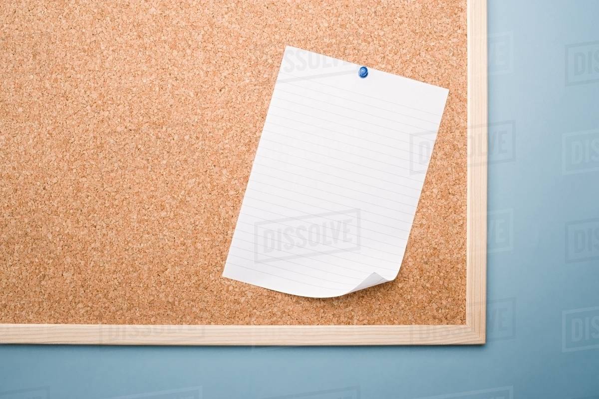 Paper on a noticeboard - Stock Photo - Dissolve