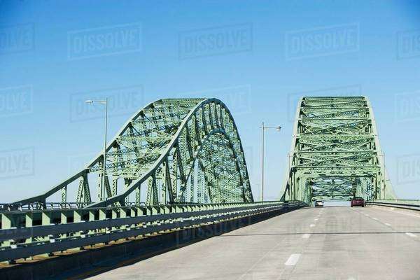 Cars driving on bridge - Royalty-free Stock Photo | Dissolve