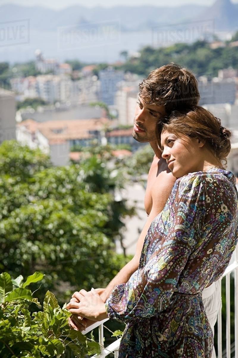 Romantic couple on a balcony - Royalty-free Stock Photo | Dissolve