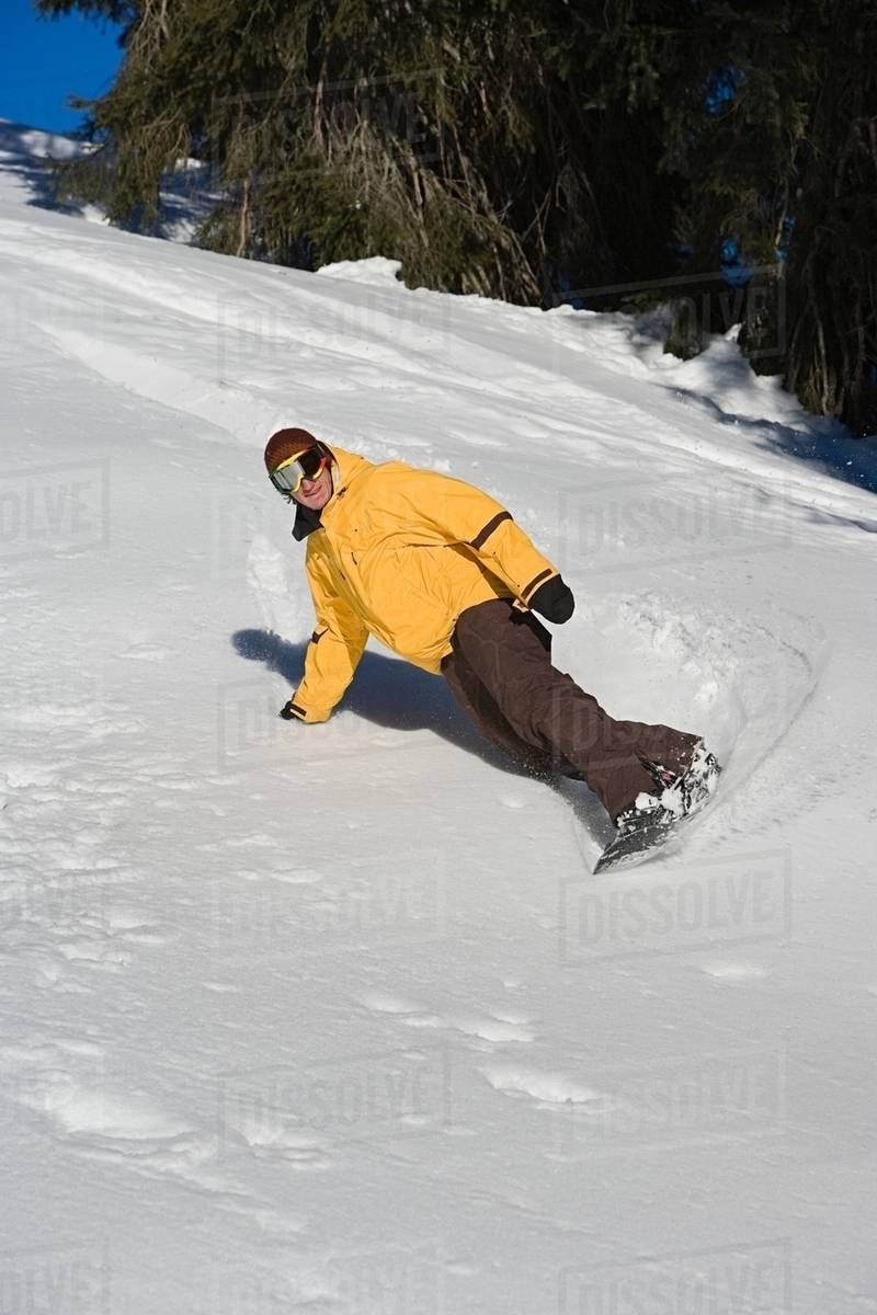 A man snowboarding - Stock Photo - Dissolve