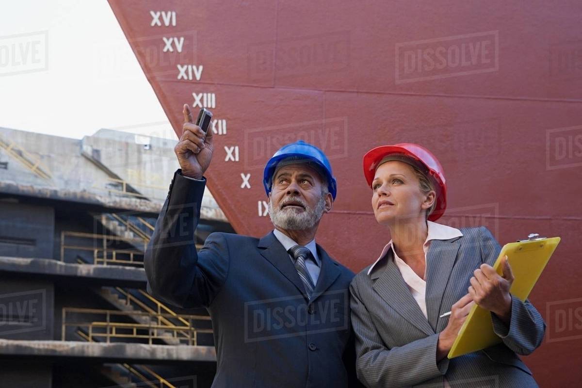 Engineers by ship - Royalty-free Stock Photo | Dissolve