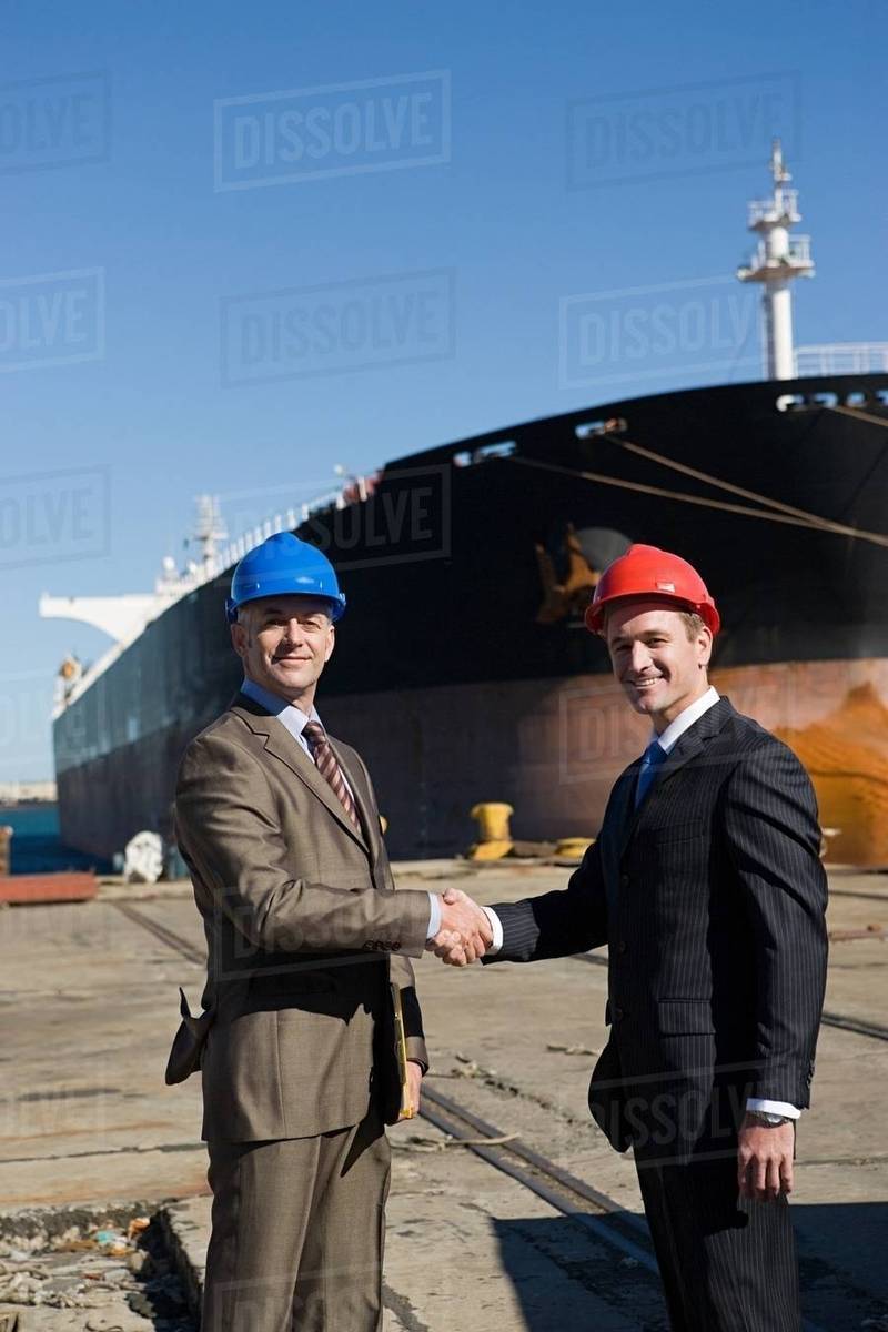 Engineers shaking hands - Royalty-free Stock Photo | Dissolve