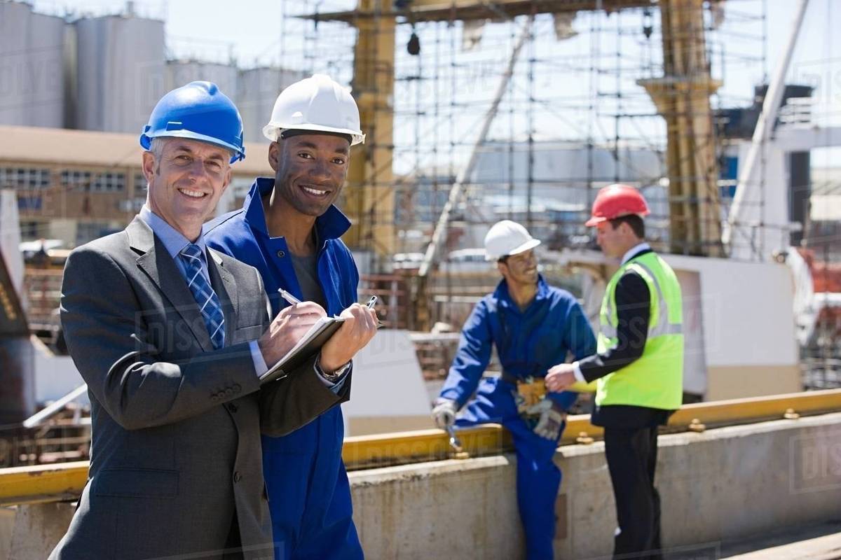 Engineers at harbour - Royalty-free Stock Photo | Dissolve