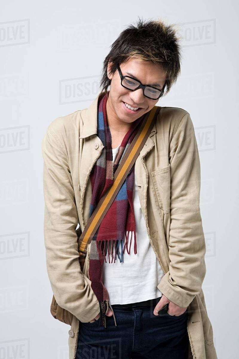 Smiling young japanese man - Royalty-free Stock Photo | Dissolve