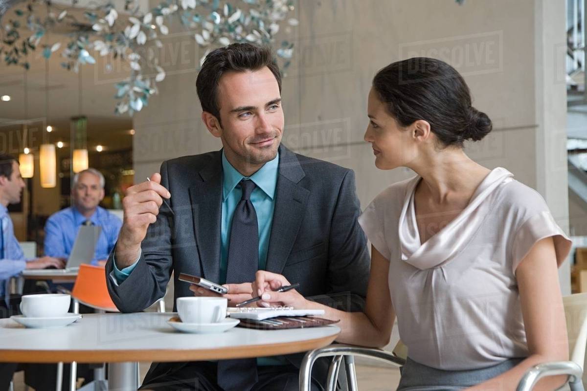 Colleagues having coffee - Royalty-free Stock Photo | Dissolve