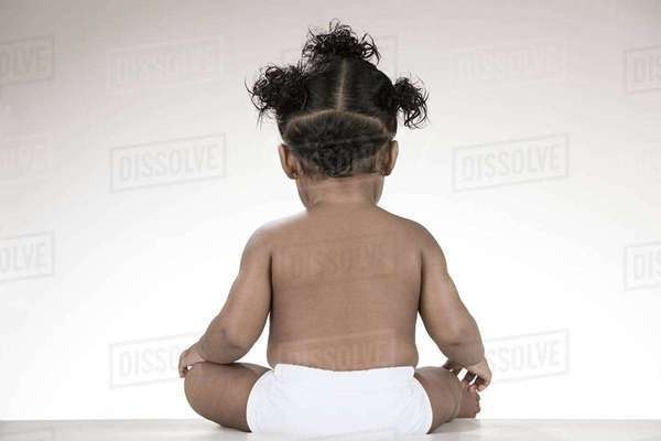 Rear view of a baby girl - Royalty-free Stock Photo | Dissolve