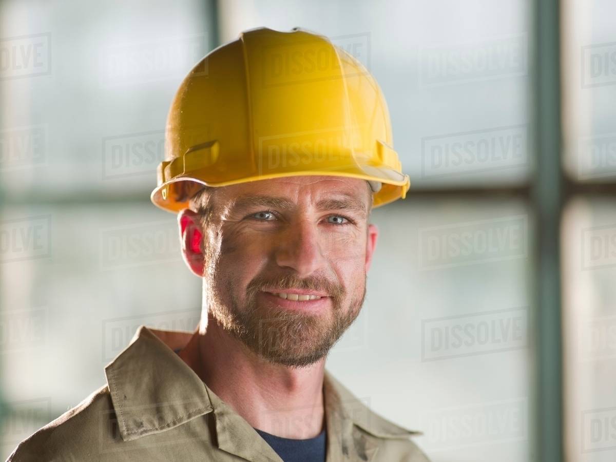 Engineer wearing hard hat on site - Royalty-free Stock Photo | Dissolve