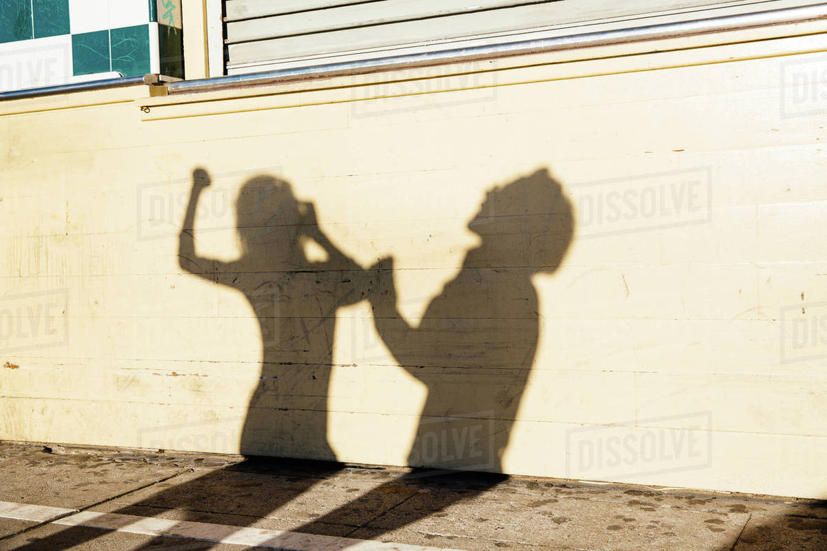 Shadow on wall of couple dancing, outdoors - Royalty-free Stock Photo ...