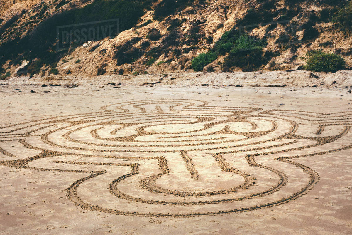 Line drawing pattern drawn onto beach sand, Crystal Cove State Park ...