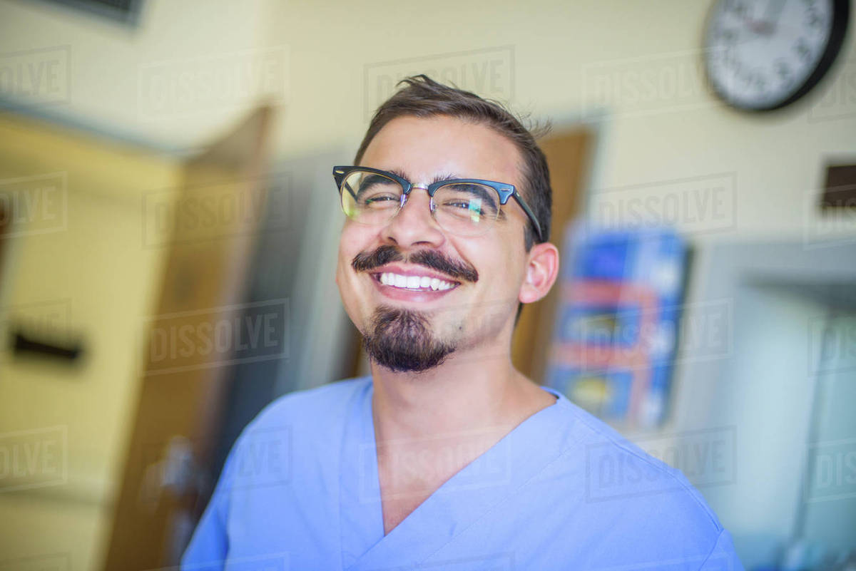 Happy hospital staff smiling - Royalty-free Stock Photo | Dissolve