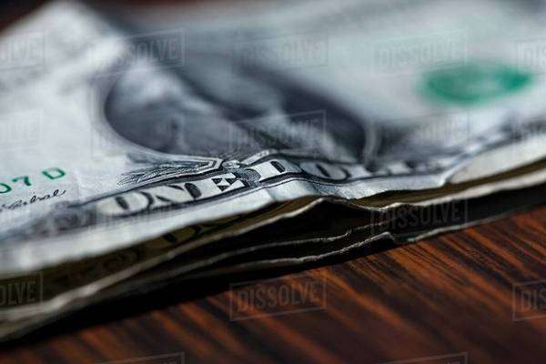 Money on table - Stock Photo - Dissolve