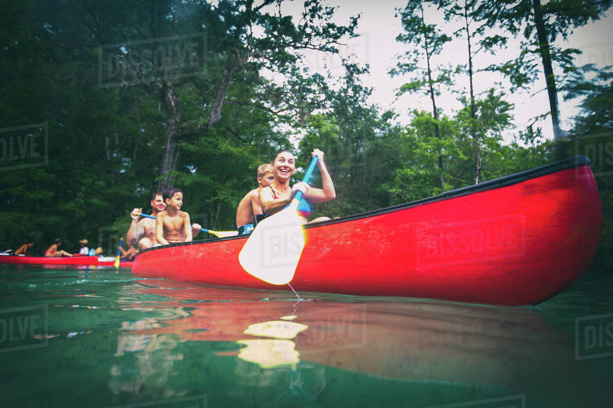 Family on a canoe trip together at Econfina Spring, Florida, USA ...
