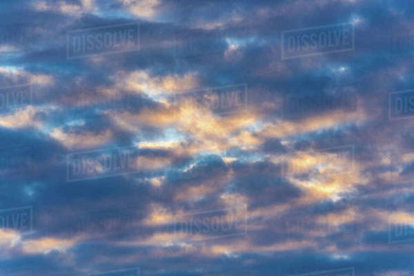 Soft focus of clouds illuminated by rays of sun at sunset - Royalty ...
