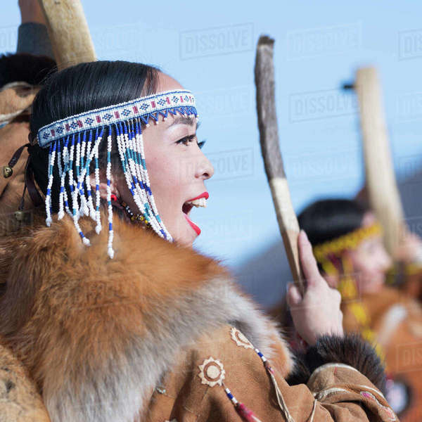 Female dancing with tambourine in tradition clothing aboriginal people ...