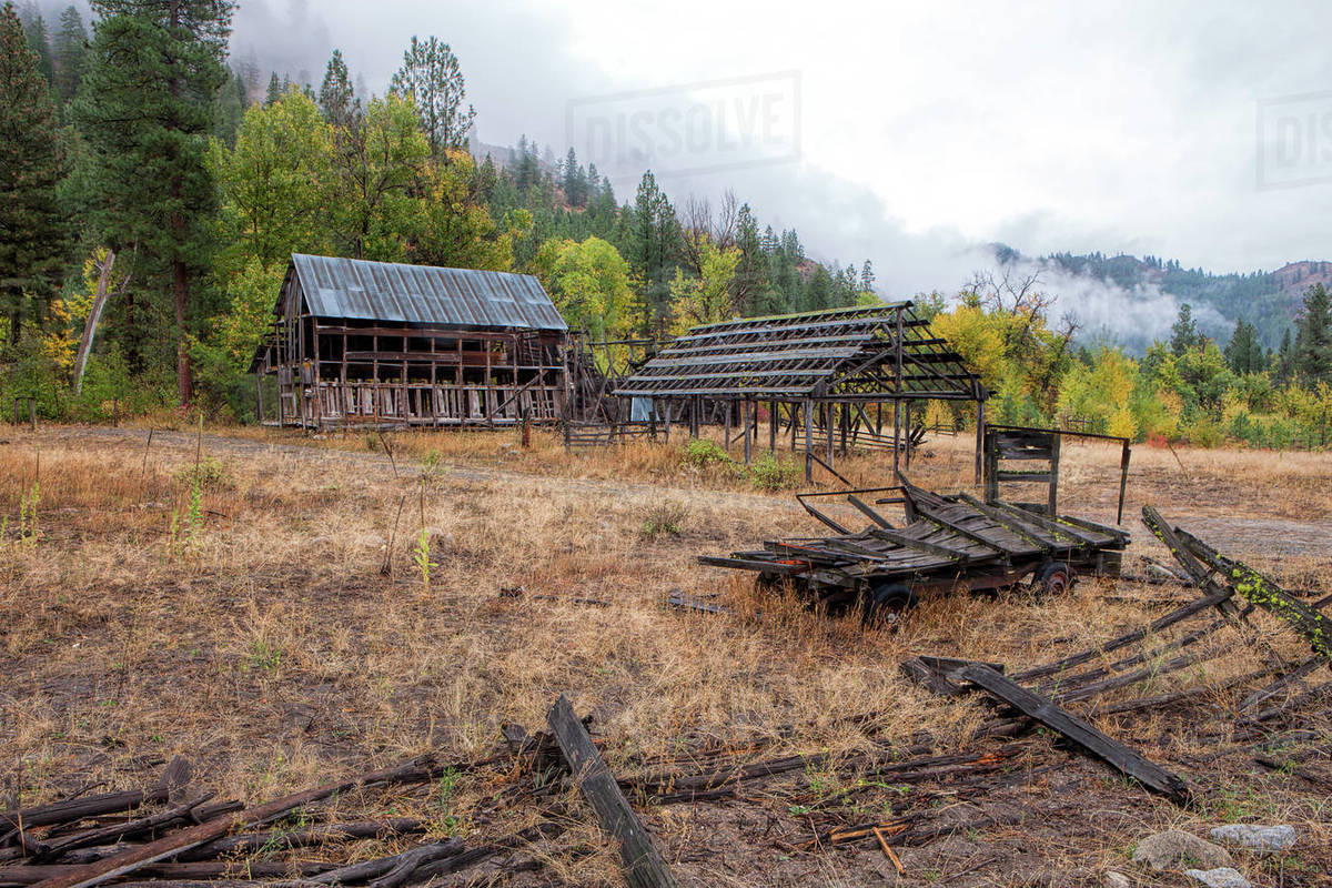 An old rundown barn and fence in Okanagon county in Washington near ...