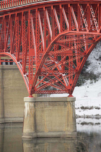A close up of the support structure of a red bridge in Ione, Washington ...