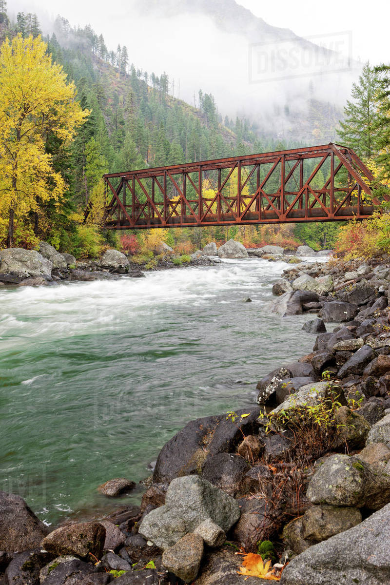 A steel bridge for walking spans over the Wenatchee River just west of ...