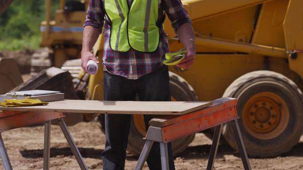 Construction worker looking over plans - 4K Royalty-free Stock Video ...