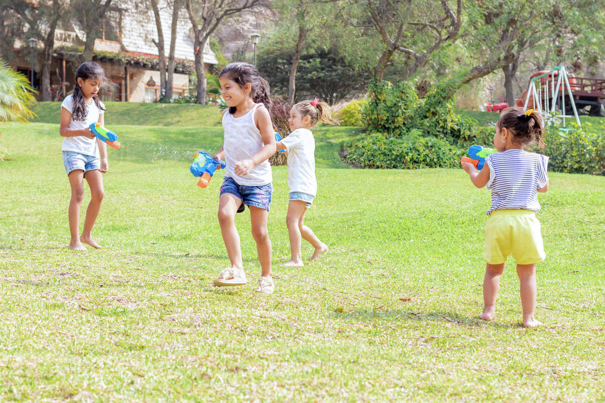 Little girls playing with water in the summer - Royalty-free Stock ...