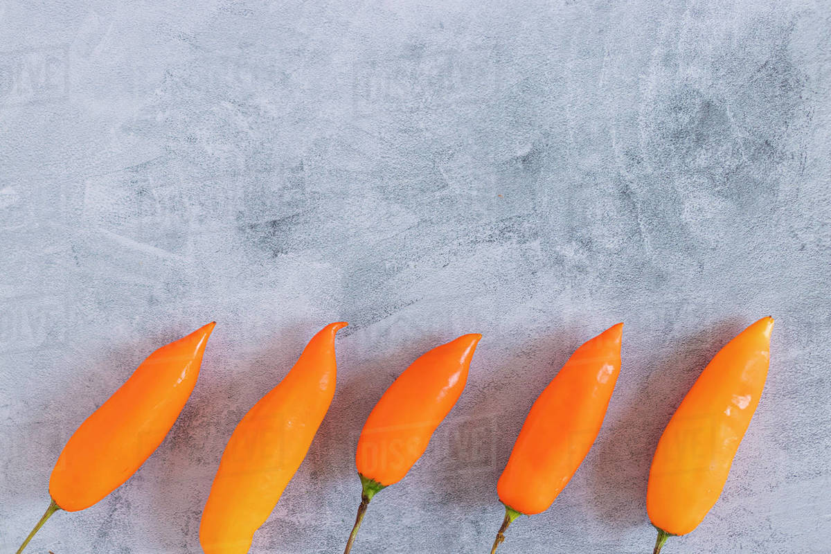 Display of Peruvian yellow peppers - Royalty-free Stock Photo | Dissolve