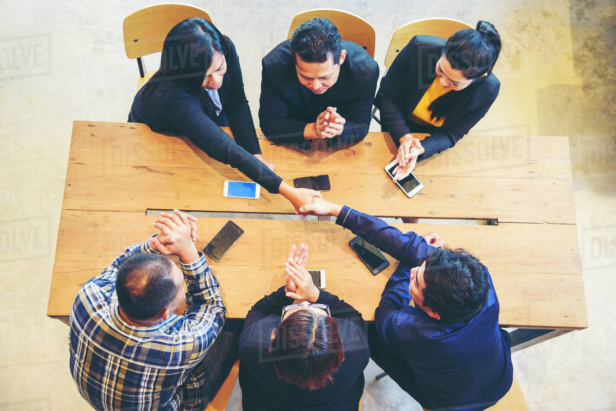 Group of diversity people fist bump holding hands together power of tag ...
